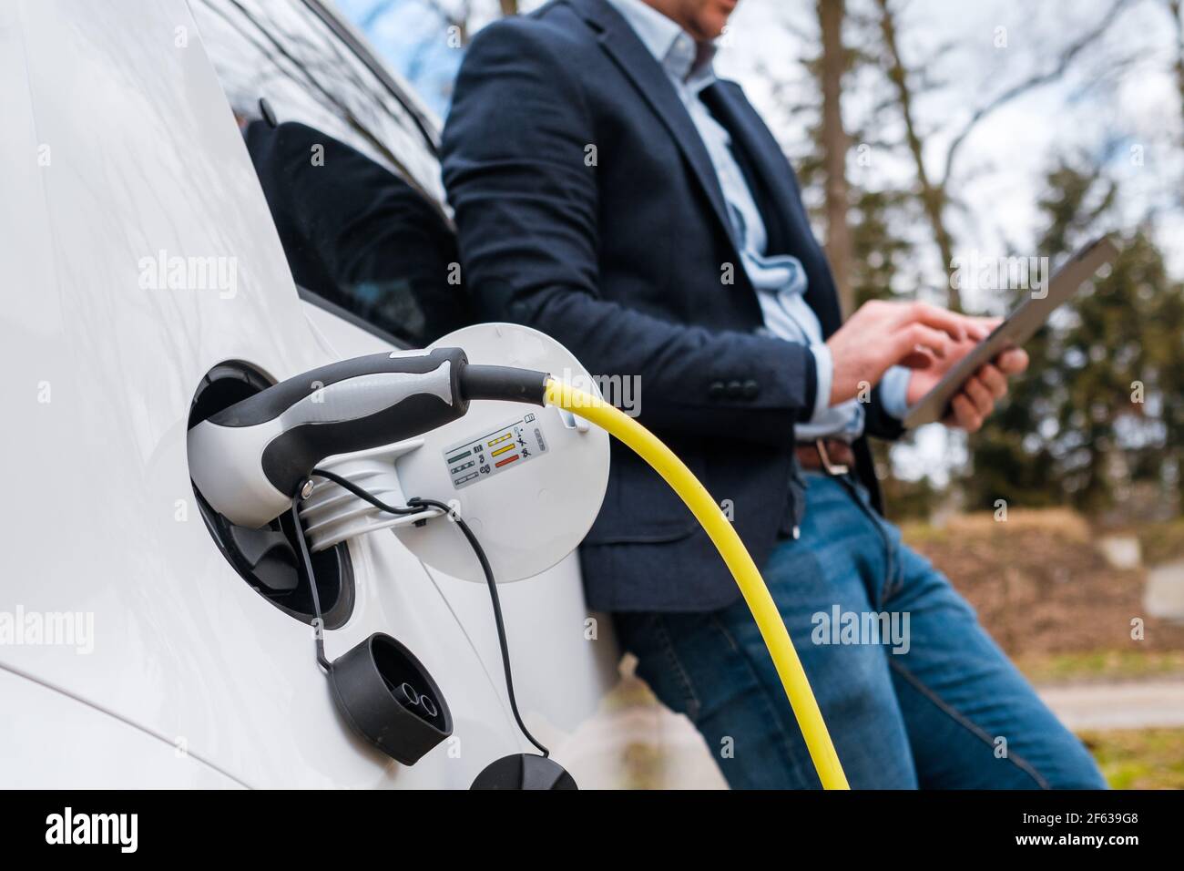 Using an ev charger hi-res stock photography and images - Alamy