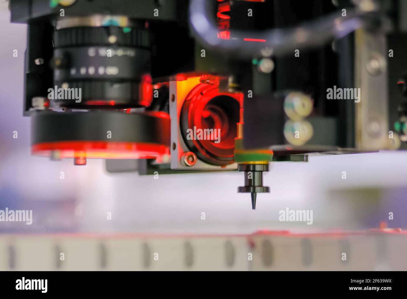 Automatic SMD pick and place machine assembling computer circuit board: close up Stock Photo - Alamy