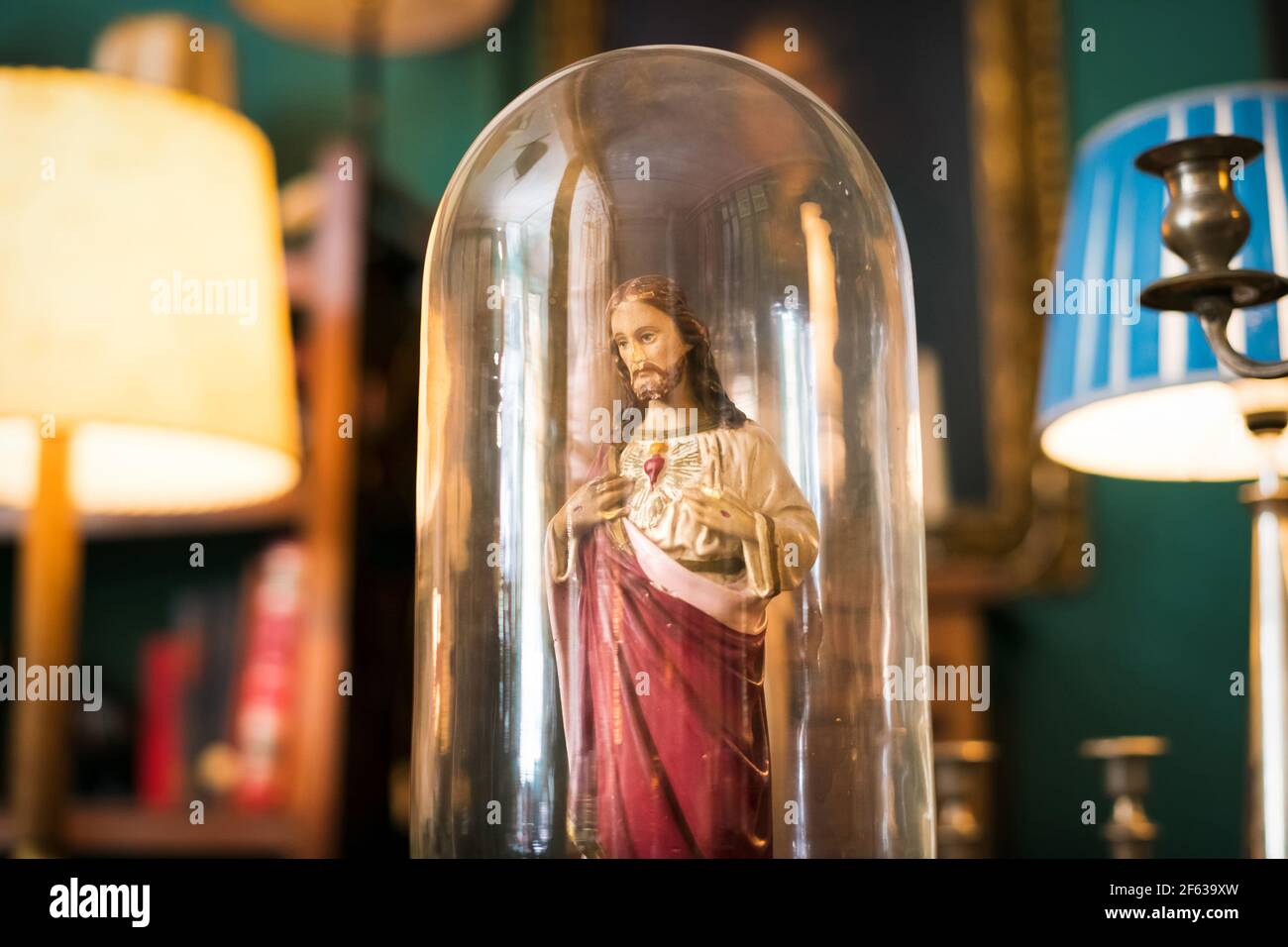 Small vintage statuette of Christ displaying his heart in a vintage ...