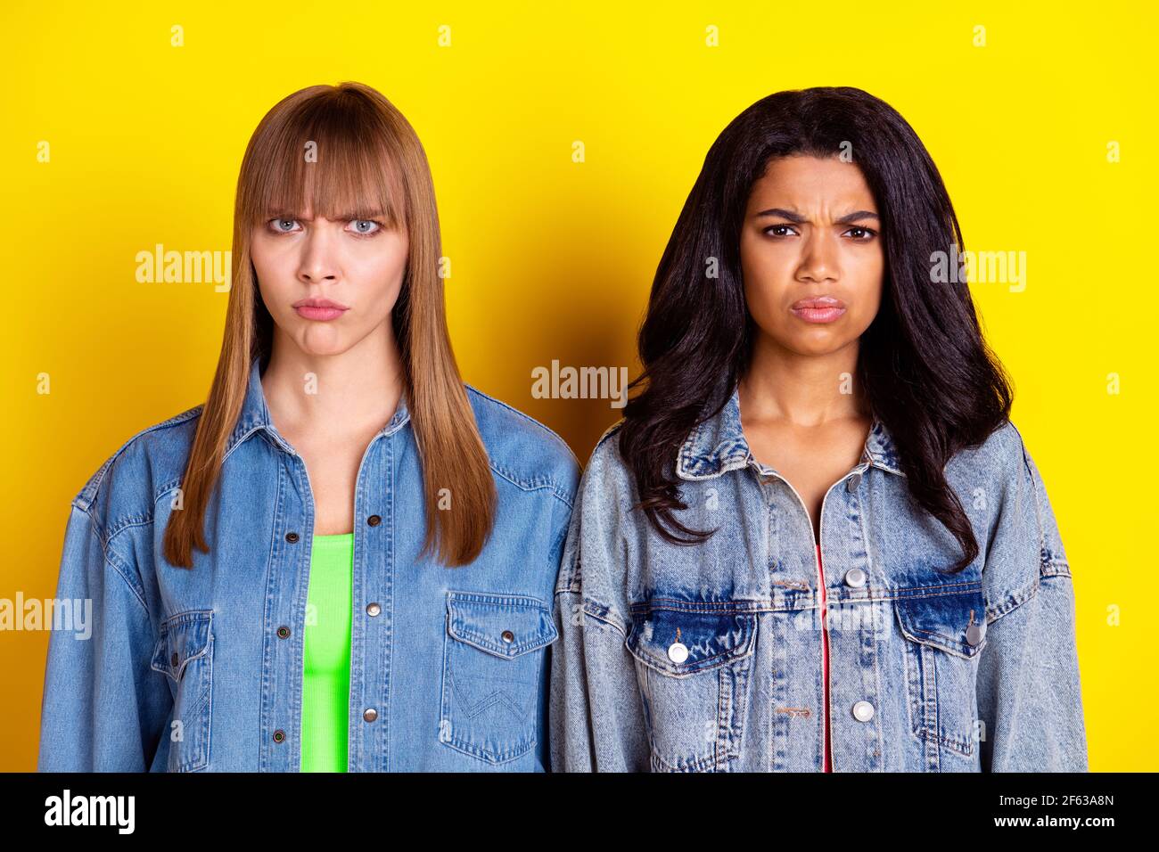 Photo of young unhappy angry women best friends looking furiously ...