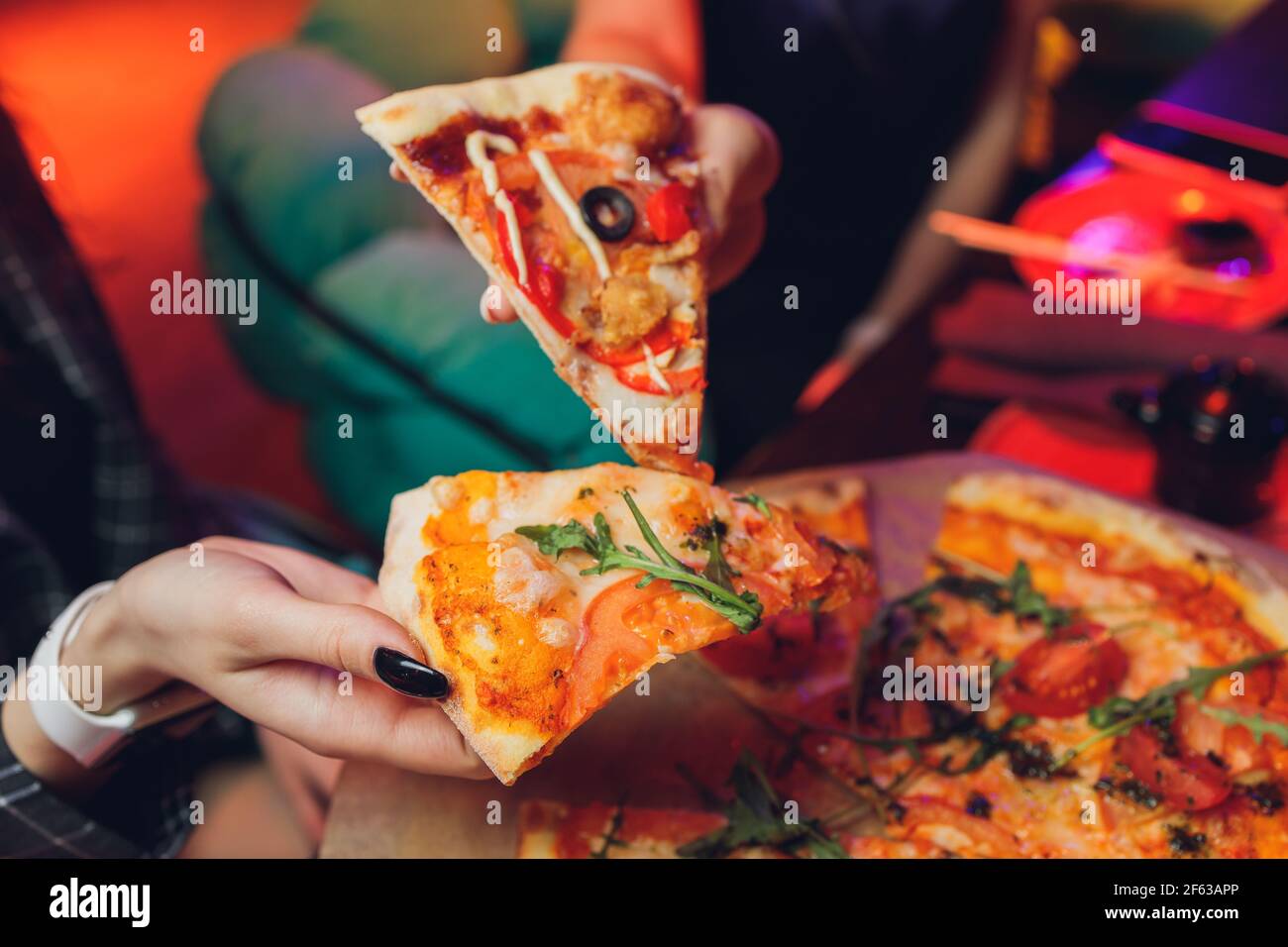 Eating Food Close Up Of People Hands Taking Slices Of Pepperoni Pizza