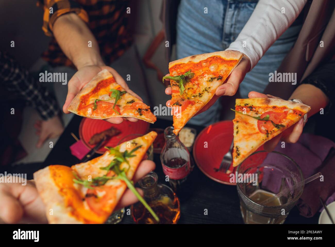 Eating Food Close Up Of People Hands Taking Slices Of Pepperoni Pizza