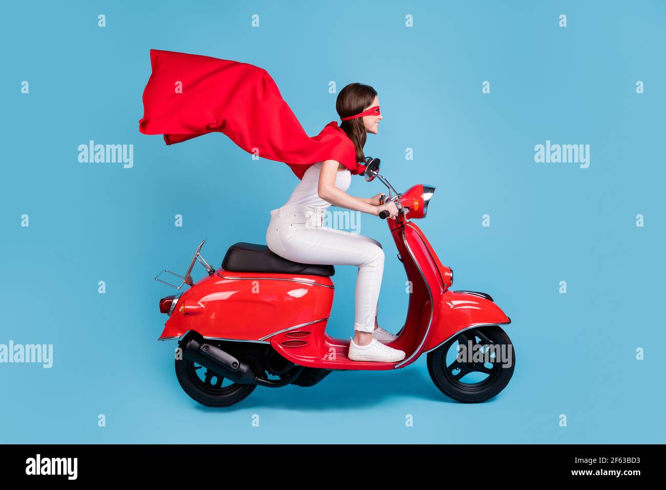 Full length profile photo of attractive hero lady drive moped wear ...