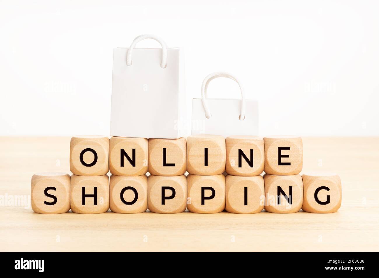 Online shopping concept. Text on wooden blocks on table and paper ...