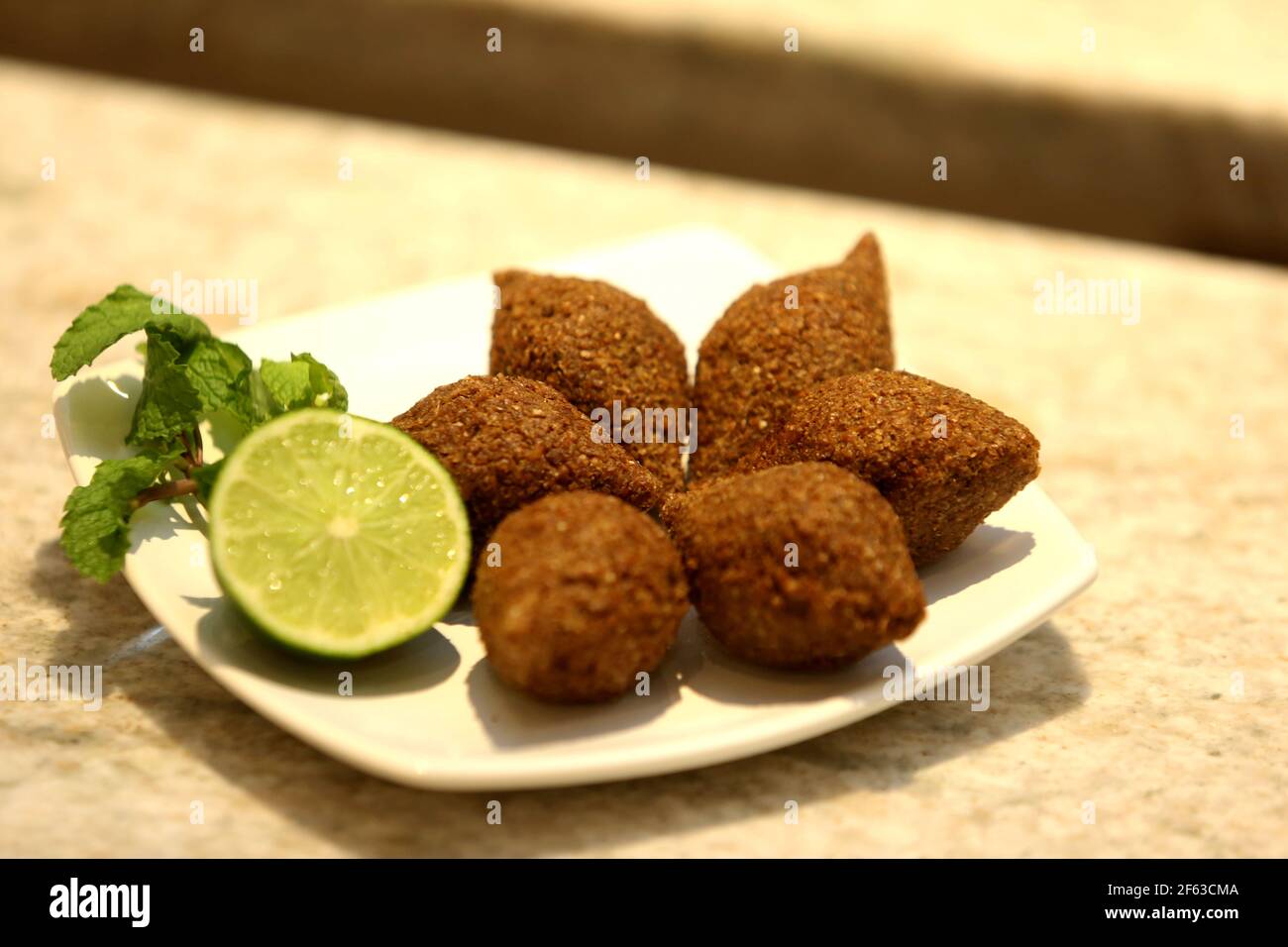 salvador, bahia / brazil - august 27, 2018: kibe potion, food of aribe ...