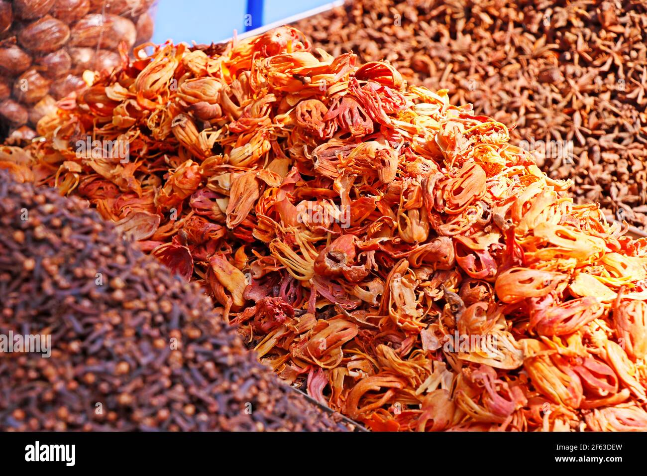 assorted spices like cardamom, cloves, mace etc, in a street stall for ...