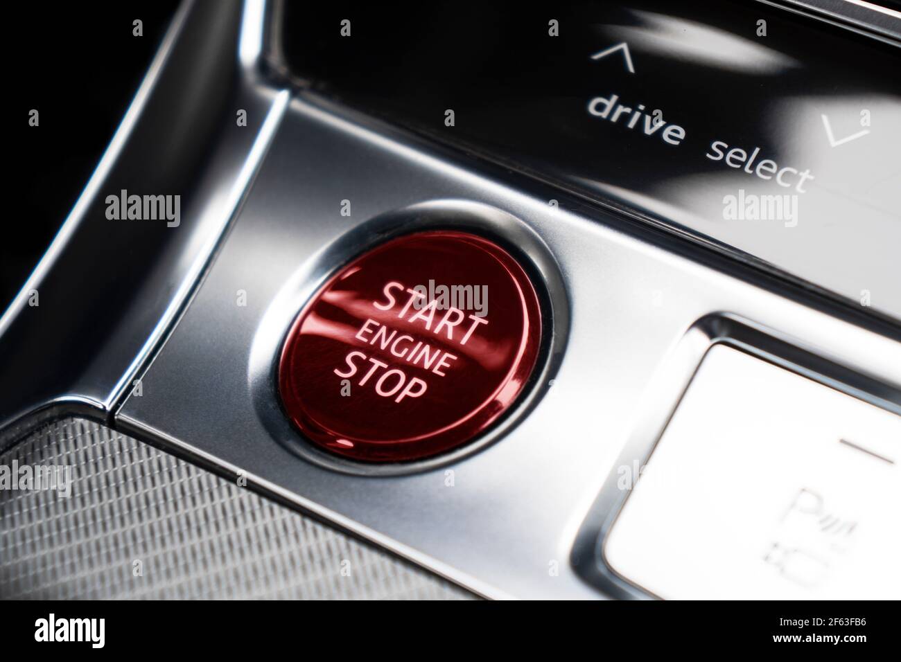Car dashboard with focus on engine start stop button. Modern car ...