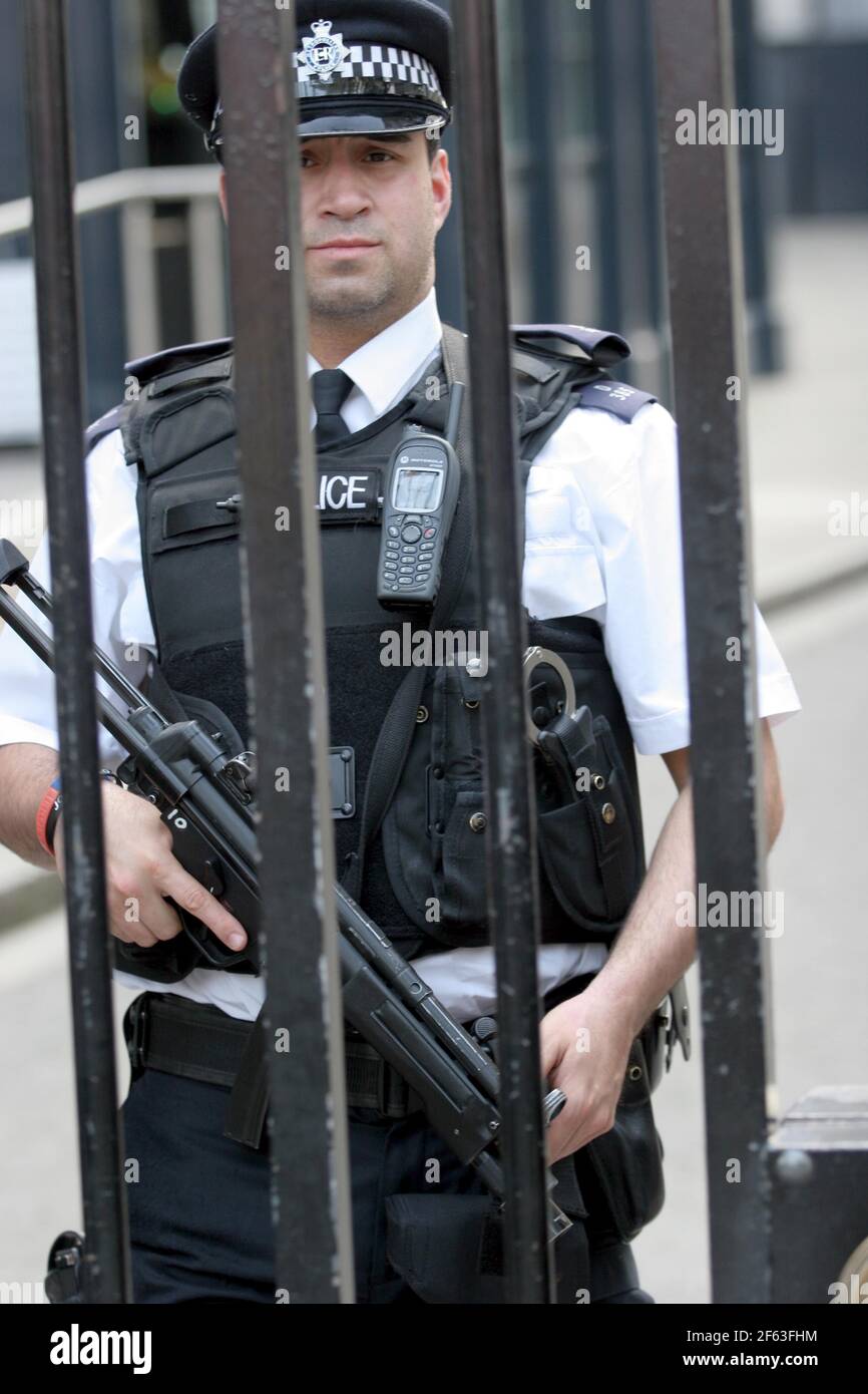 Security gates and armed police guards hi-res stock photography and ...