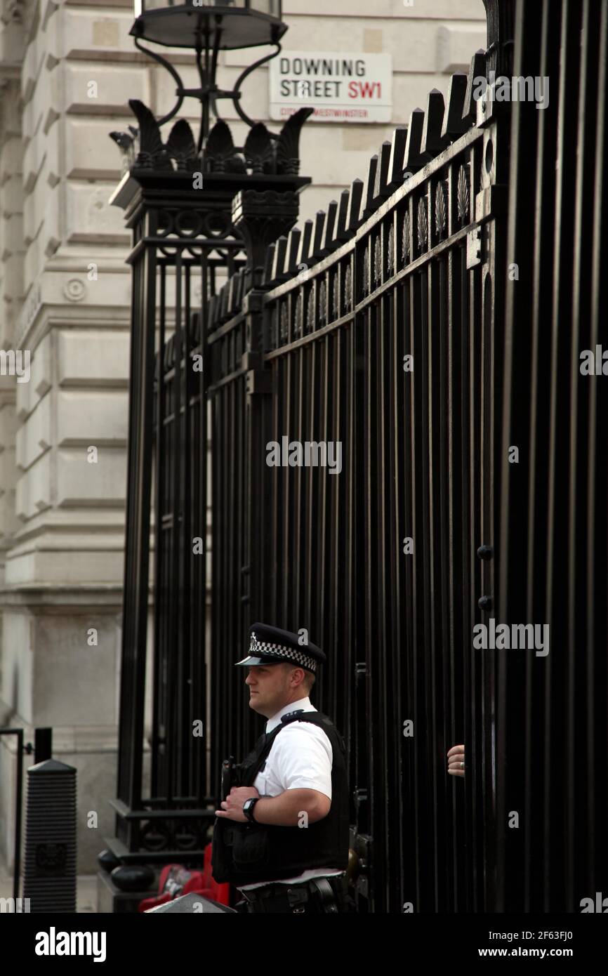 Security gates and armed police guards hi-res stock photography and ...