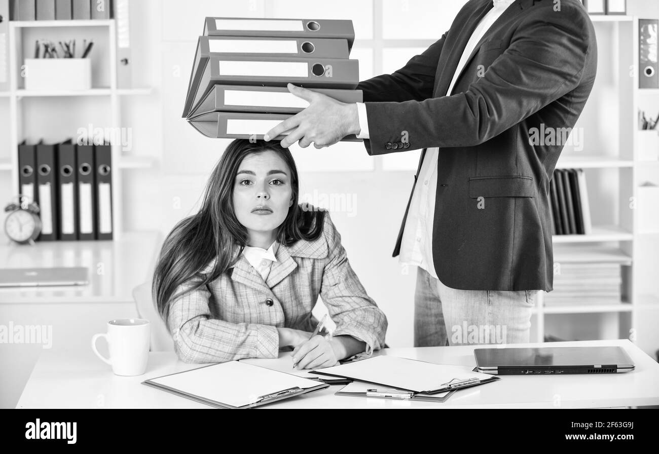 secretary with many folders. modern office life. woman and man do ...