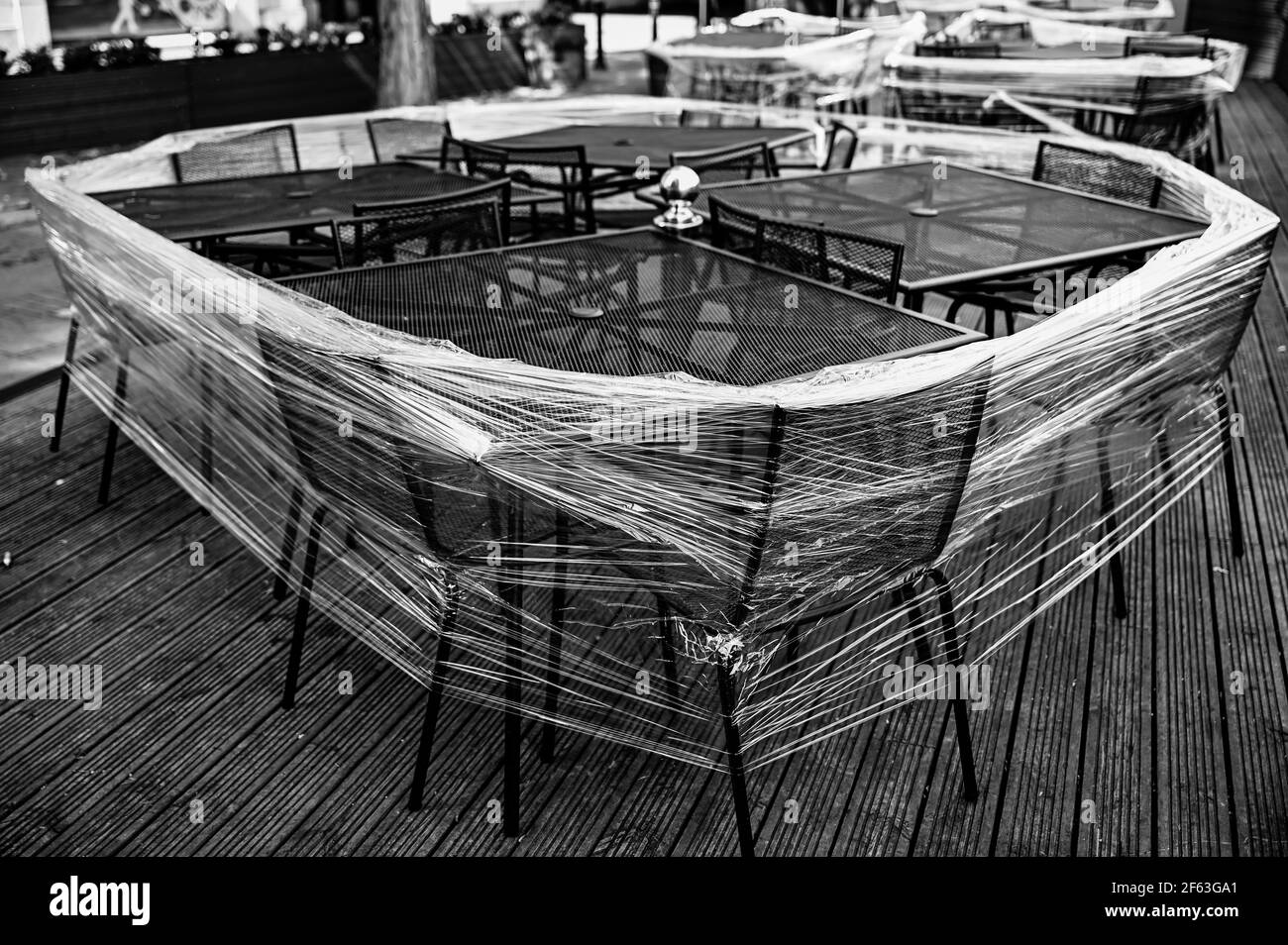 Taped up chairs in lockdown Stock Photo - Alamy
