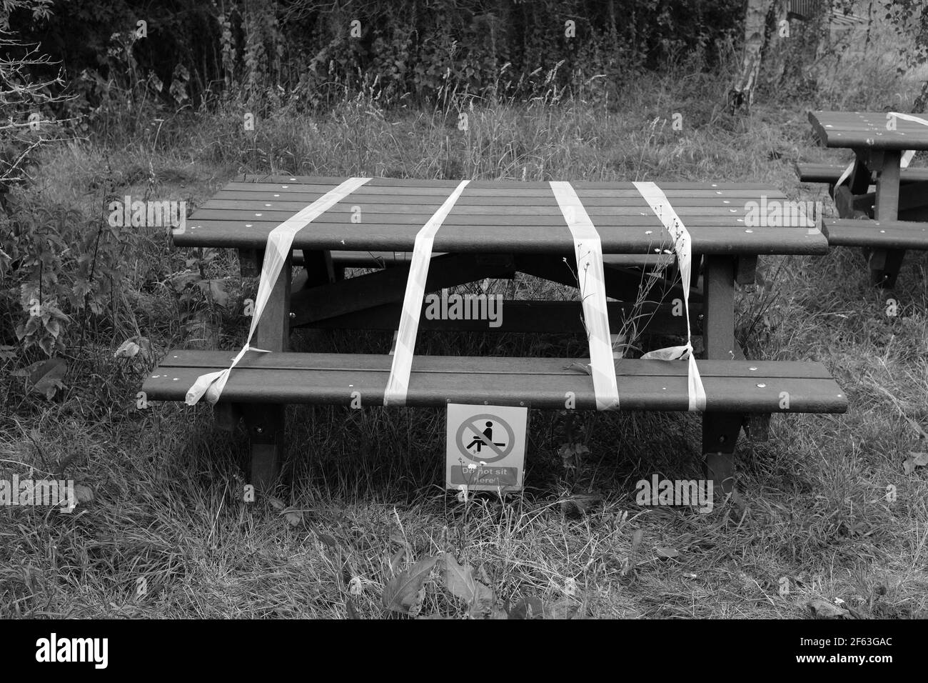 Taped up chairs in lockdown Stock Photo - Alamy
