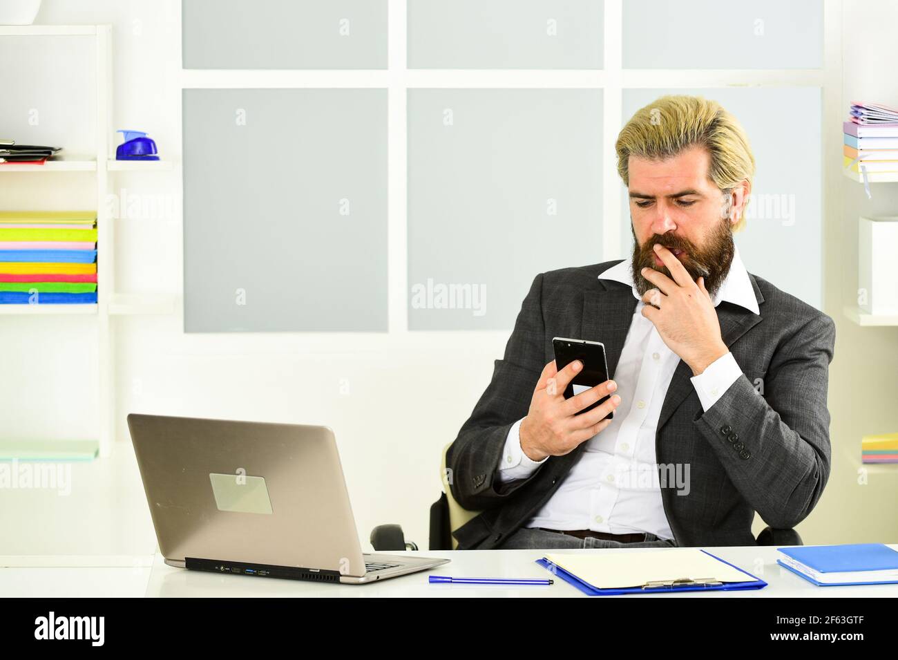 Multitasking. confident brutal businessman. Elegant businessman ...