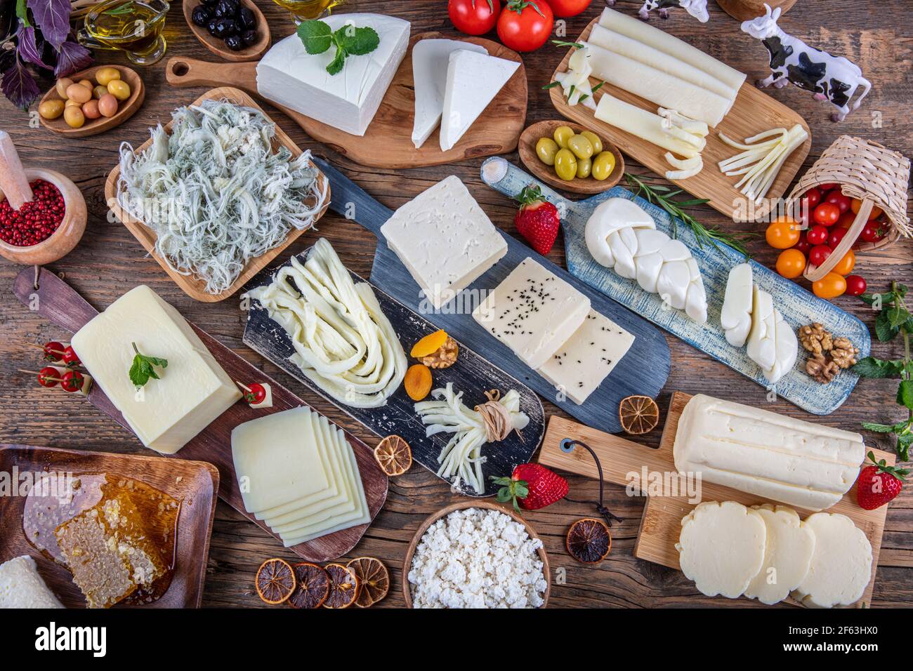 Various types of cheese,wooden old table. Great morning breakfast from ...