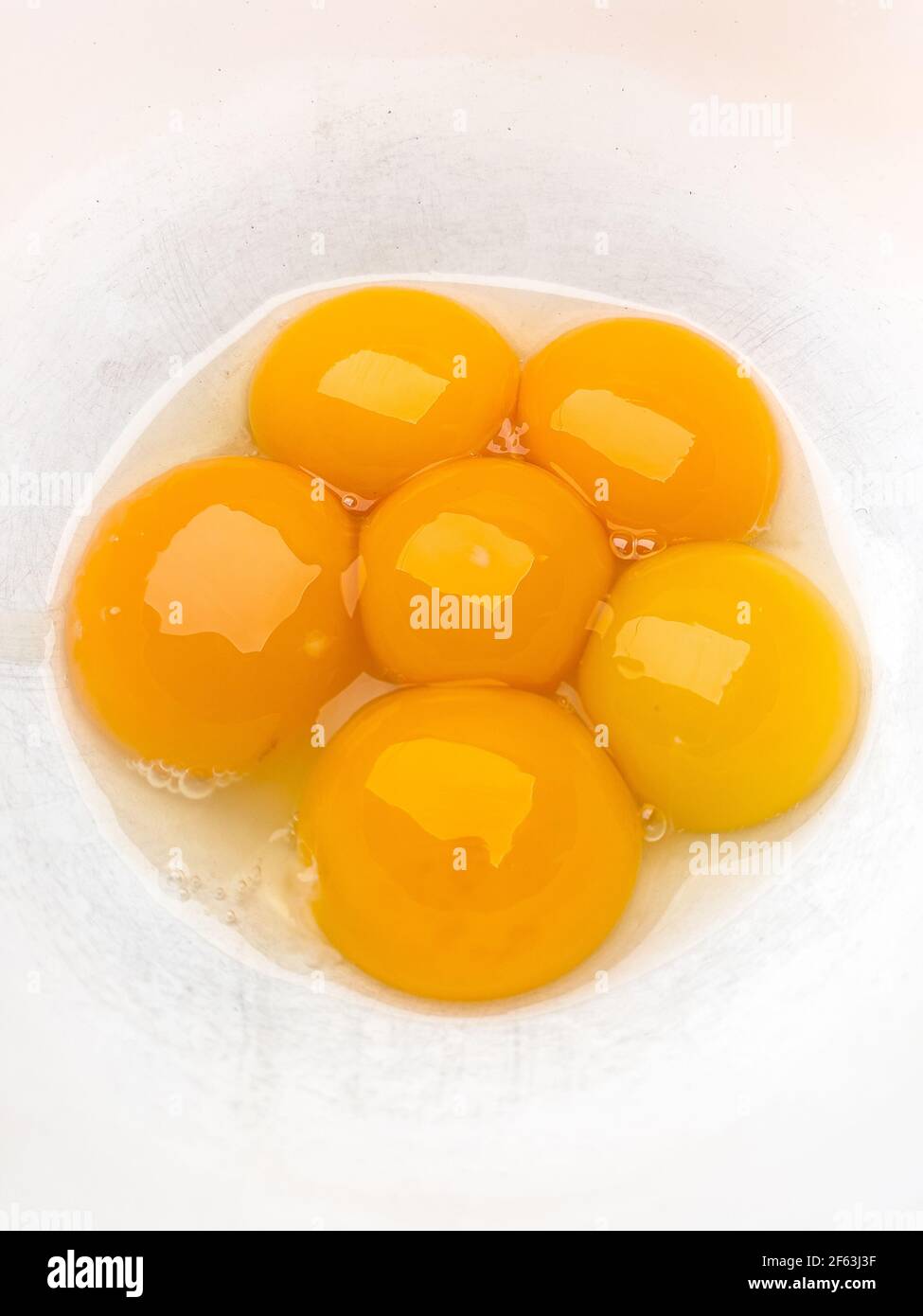 Egg yolk yellow hi-res stock photography and images - Alamy