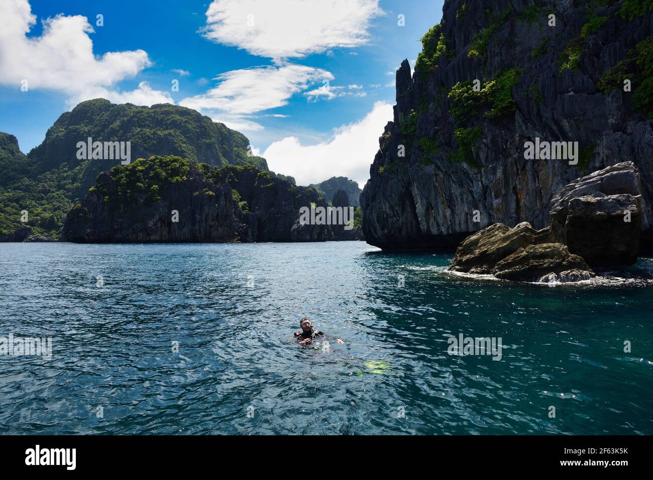 Diver at El Nido Palawan Paradise in the Philippines, Island hopping ...
