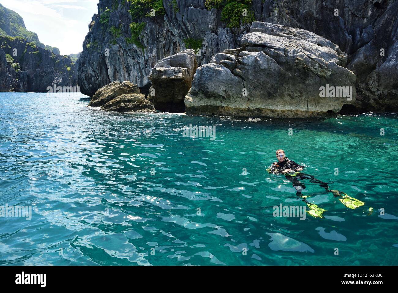 Diver at El Nido Palawan Paradise in the Philippines, Island hopping ...