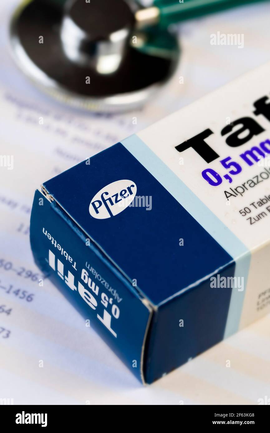 Pfizer company drug package showing the Pfizer logo Stock Photo - Alamy