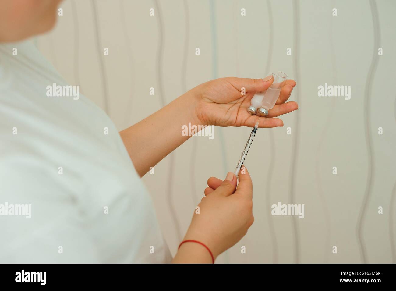 Syringe, medical injection in hand, palm or fingers. Medicine plastic ...
