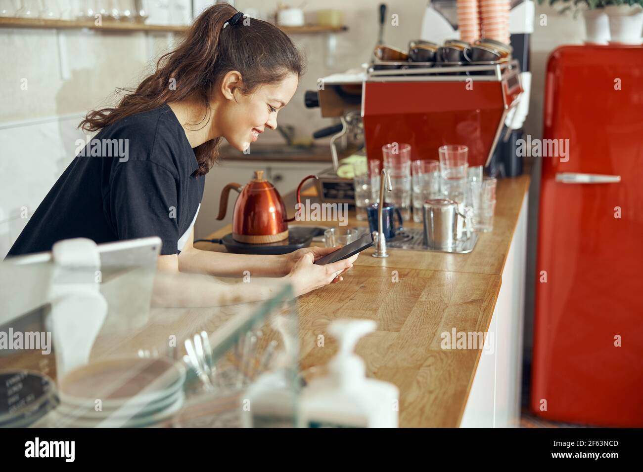 Barista taking order from customer online on smartphone. Concept of ...