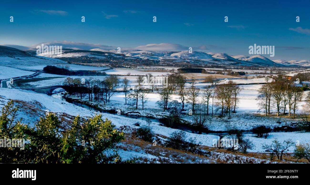 Westwood Bridge over the River Till with the small town of Wooler and ...