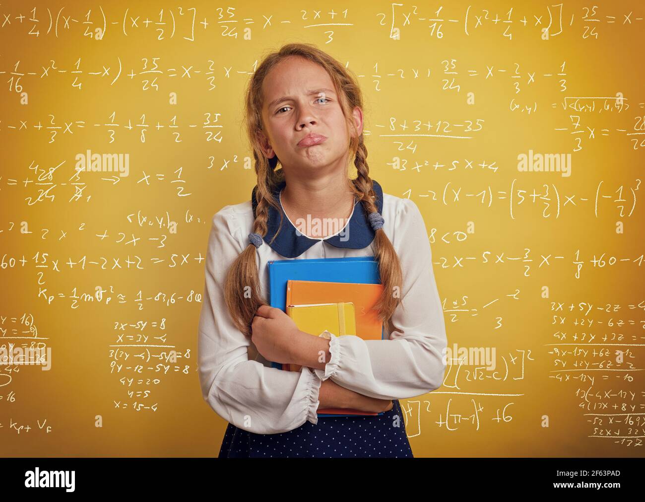 Girl cries because he has a lot of school homework. Emotional ...