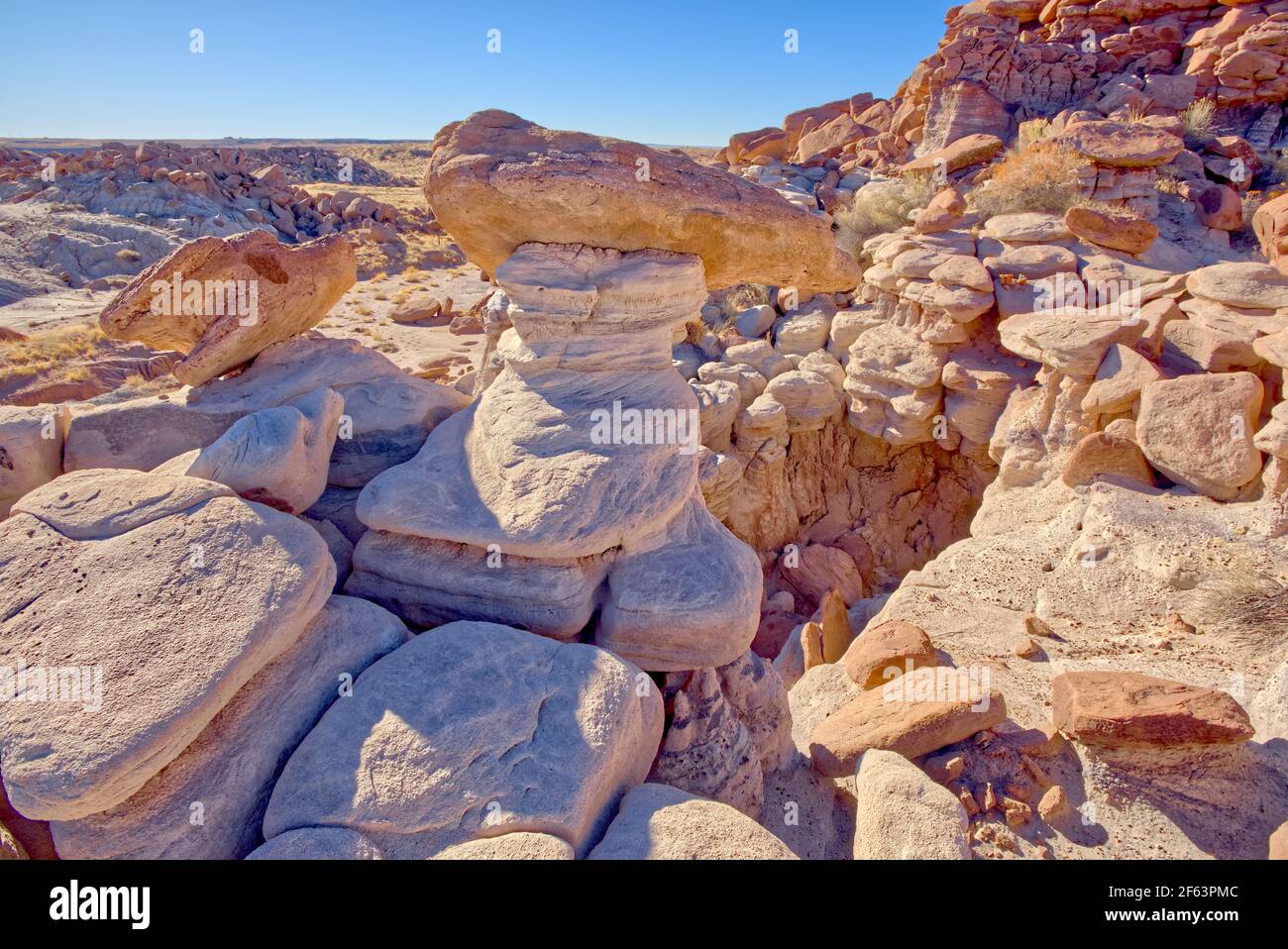 A sinkhole along a ridge in the Devil's Playground at Petrified Forest ...