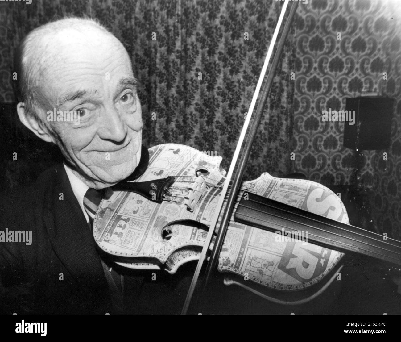 MR. LES MILLER WITH THE VIOLIN MADE FROM COP[IEW OF THE DAILY STAR ...
