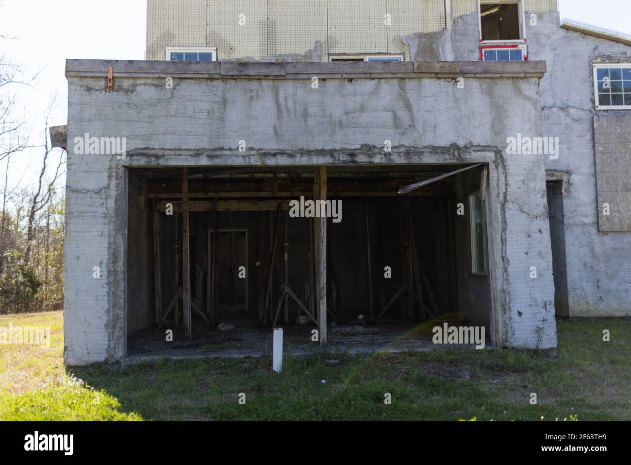 Unfinished concrete building with bright sky as background Stock Photo ...