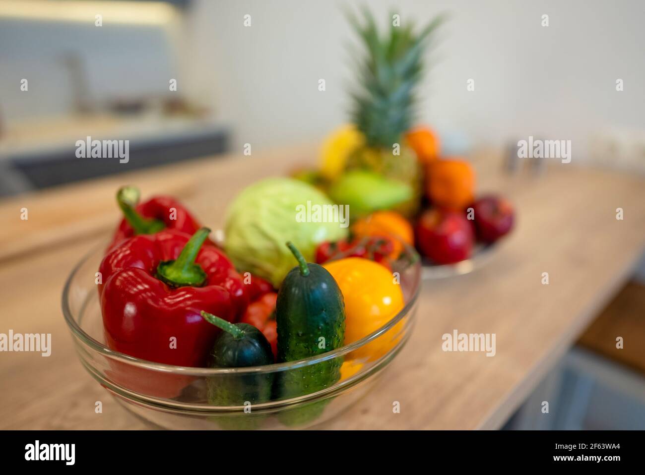 Fruits And Vegetables On The Table Of Modern Kitchen Stock Photo - Alamy
