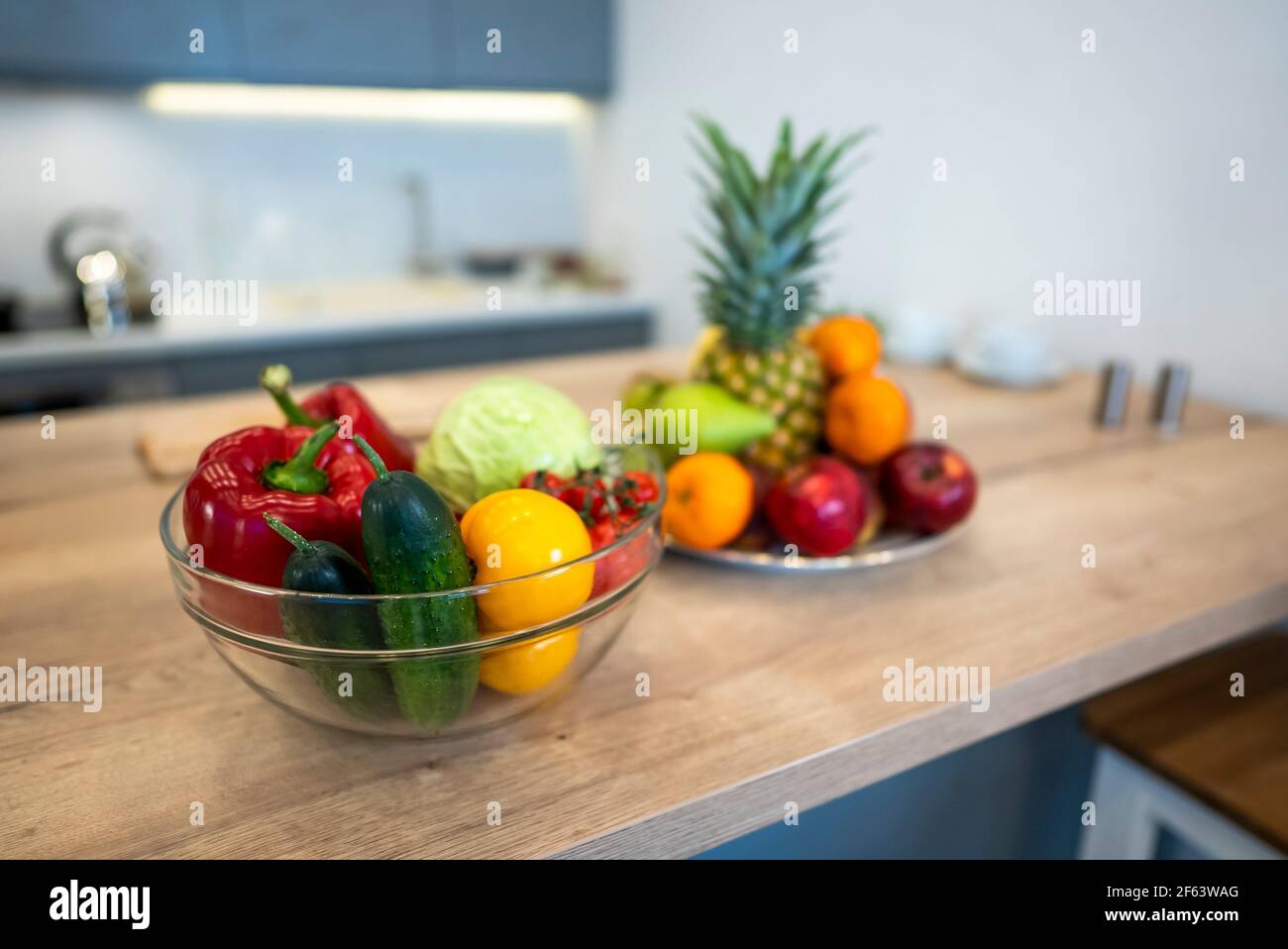 Fruits And Vegetables On The Table Of Modern Kitchen Stock Photo - Alamy