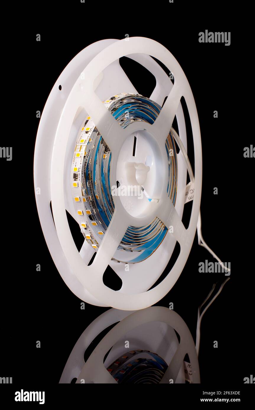 Flexible light emitting diode LED strip in the reel isolated on the ...