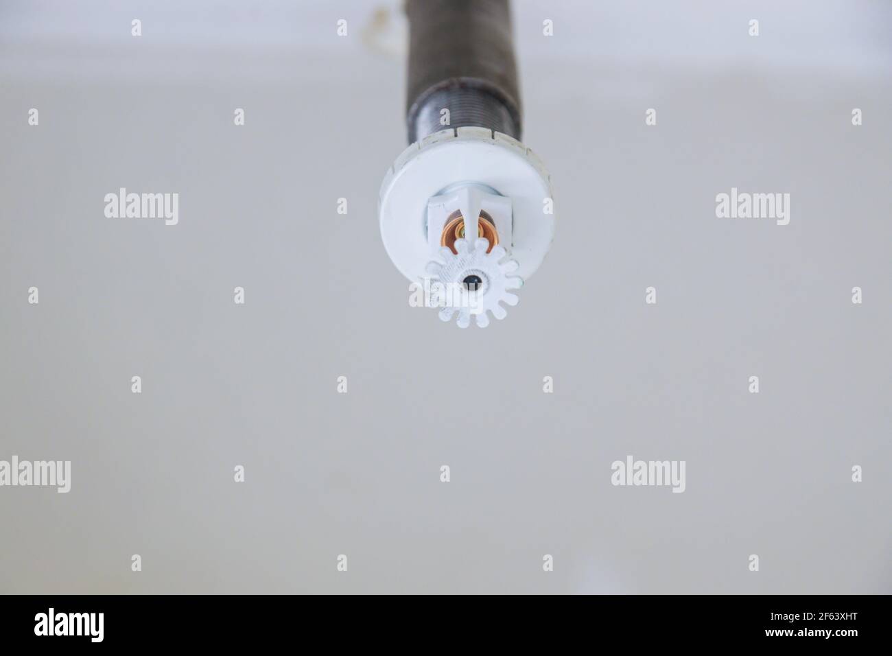 Automatic fire sprinkler system pipeline extinguishing water on the ...