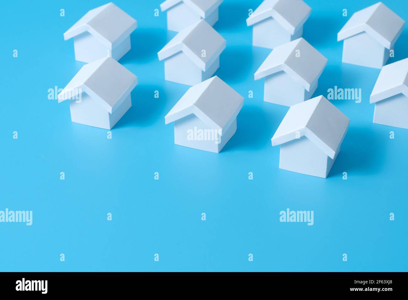 Real estate property concept using miniature white houses Stock Photo ...