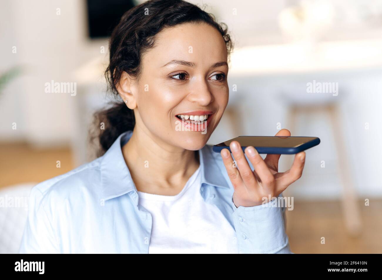 Smartphone talking hi-res stock photography and images - Alamy