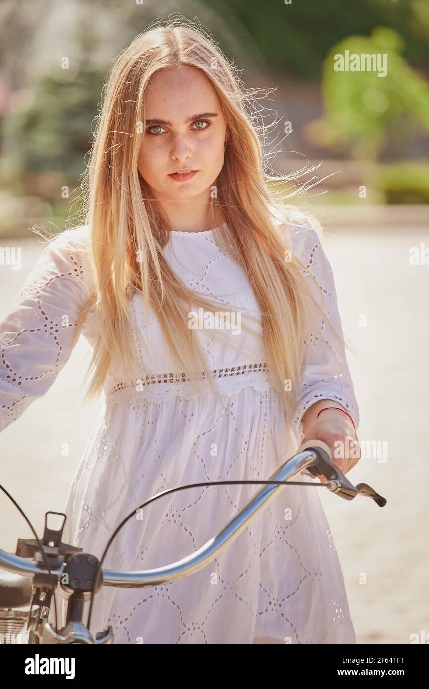 Beautiful young woman traveler walks hi-res stock photography and images - Alamy