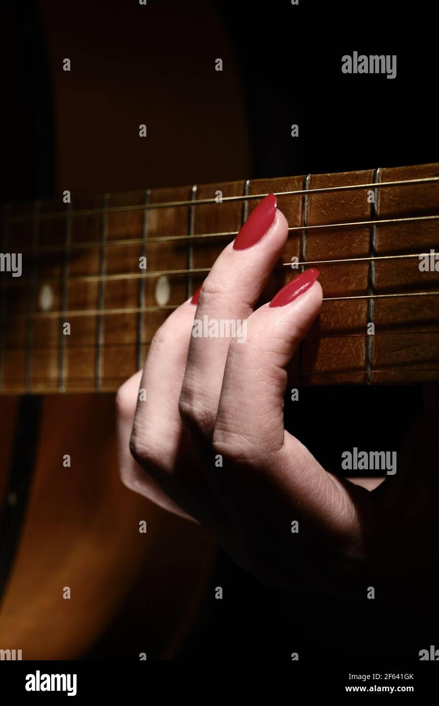 Guitar neck fingers hi-res stock photography and images - Alamy