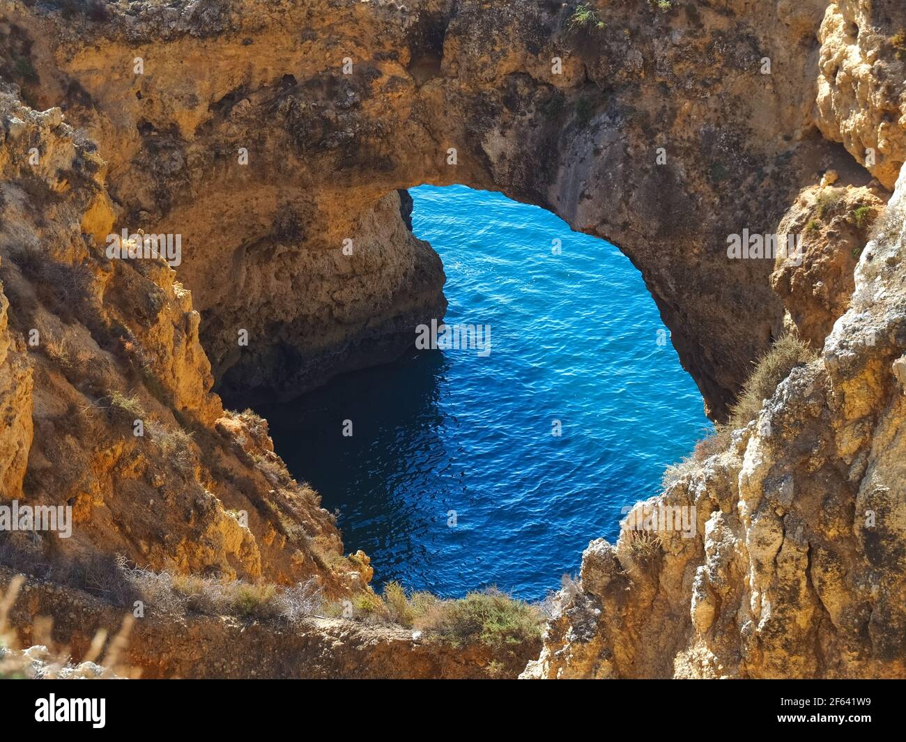 The beauty of Portugal - orange cliffs at Ponta da Piedade in Lagos ...