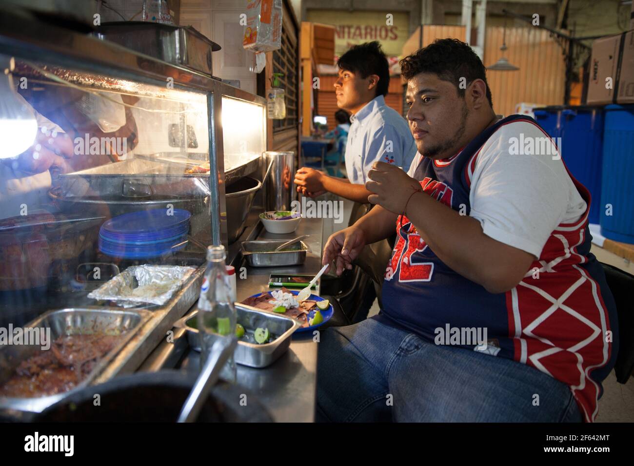 Obese Man Eating Junk Food High Resolution Stock Photography and Images ...
