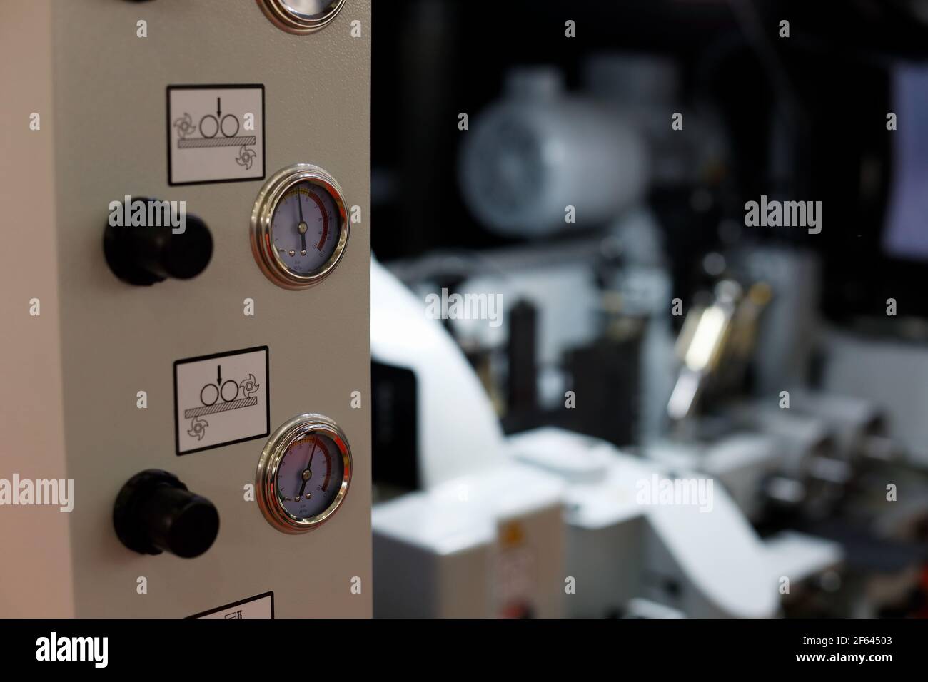 Manometers and pneumatic air pressure regulators on the control panel ...