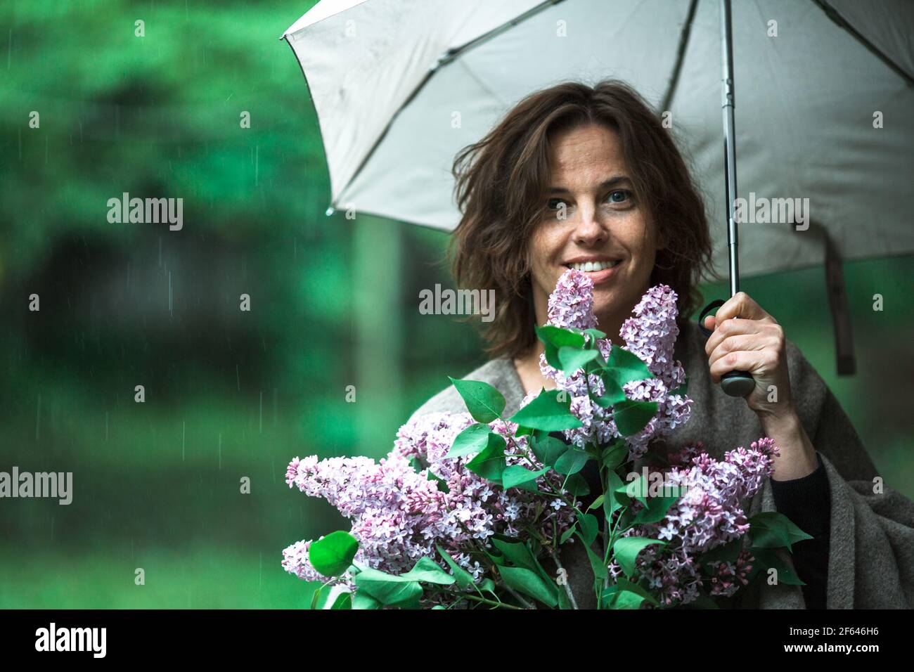 Beautiful woman face under rain hi-res stock photography and images - Alamy