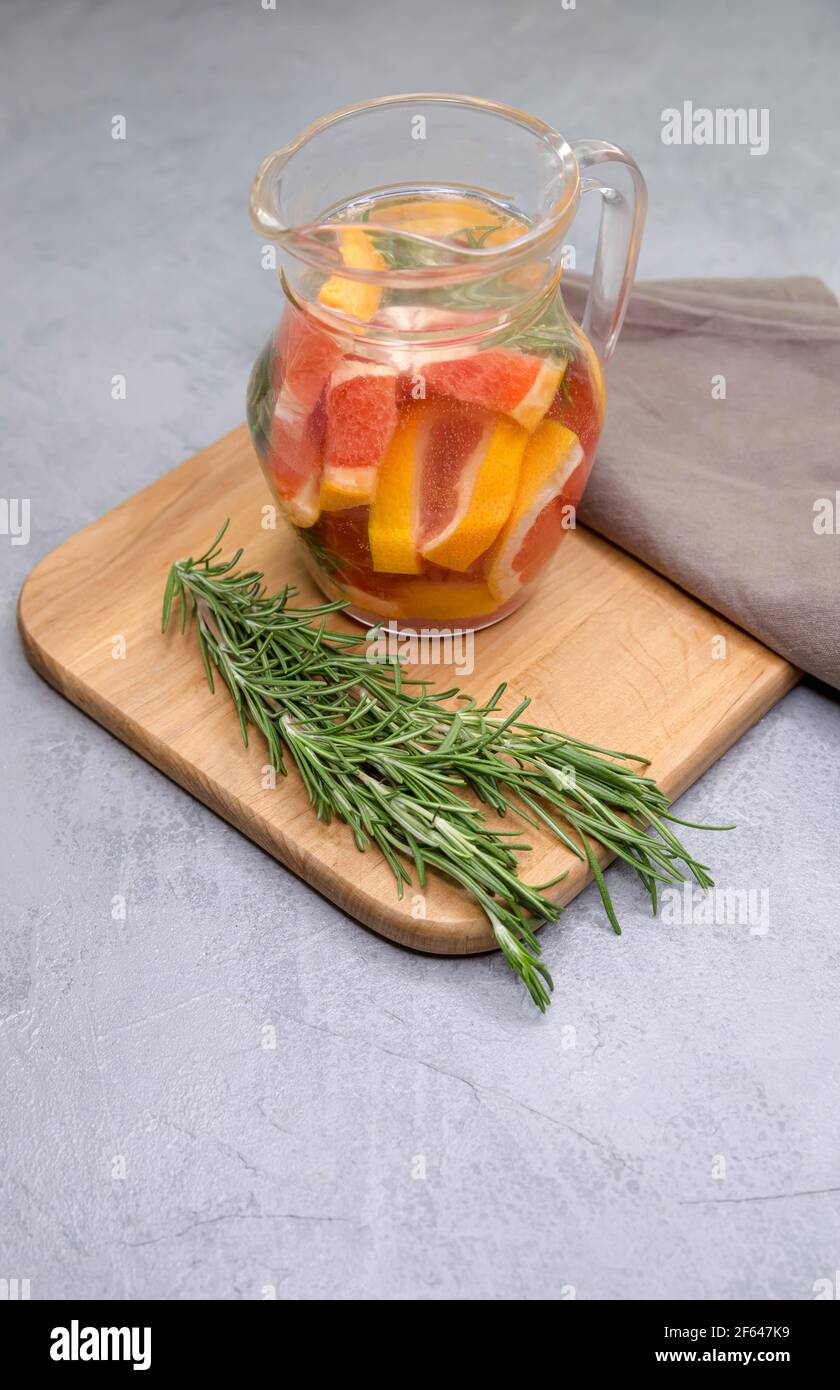 Detox citrus infused flavored water. Iced drinks with fresh fruits ...