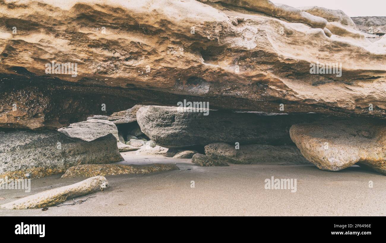 Huge boulders on the shore Stock Photo - Alamy