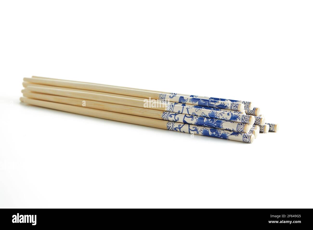 Wooden chopsticks with stacked stack pattern isolated on white ...