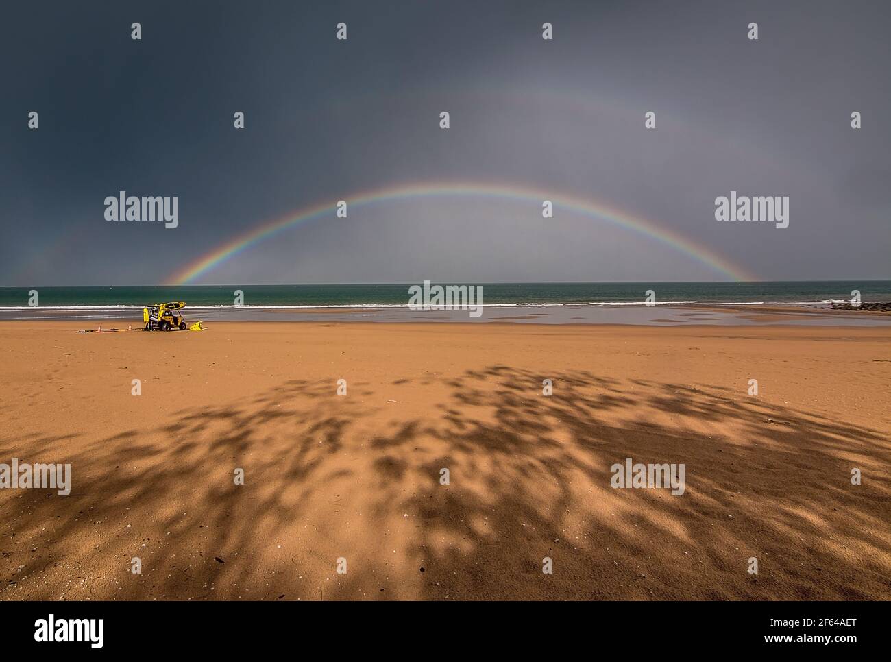 A double rainbow forms over the ocean after a storm Stock Photo - Alamy