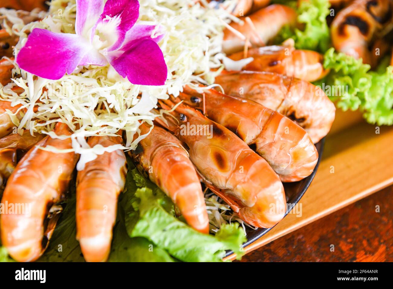 Seafood buffet Thai food, Grilled shrimp prawn with fresh vegetable and ...