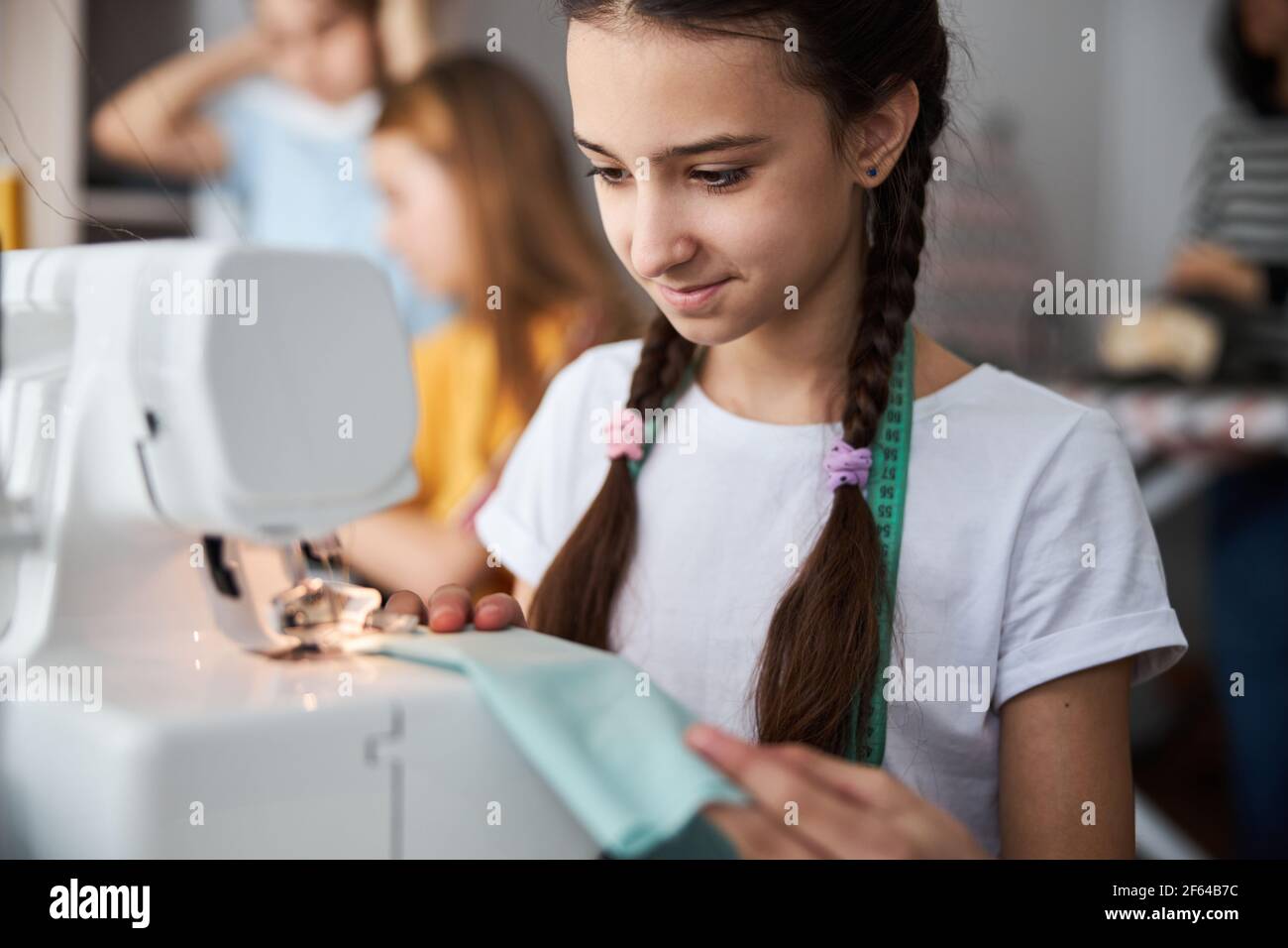 Child sewing hi-res stock photography and images - Alamy
