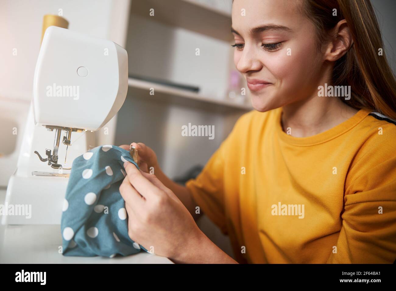 Girl Sewing High Resolution Stock Photography and Images - Alamy