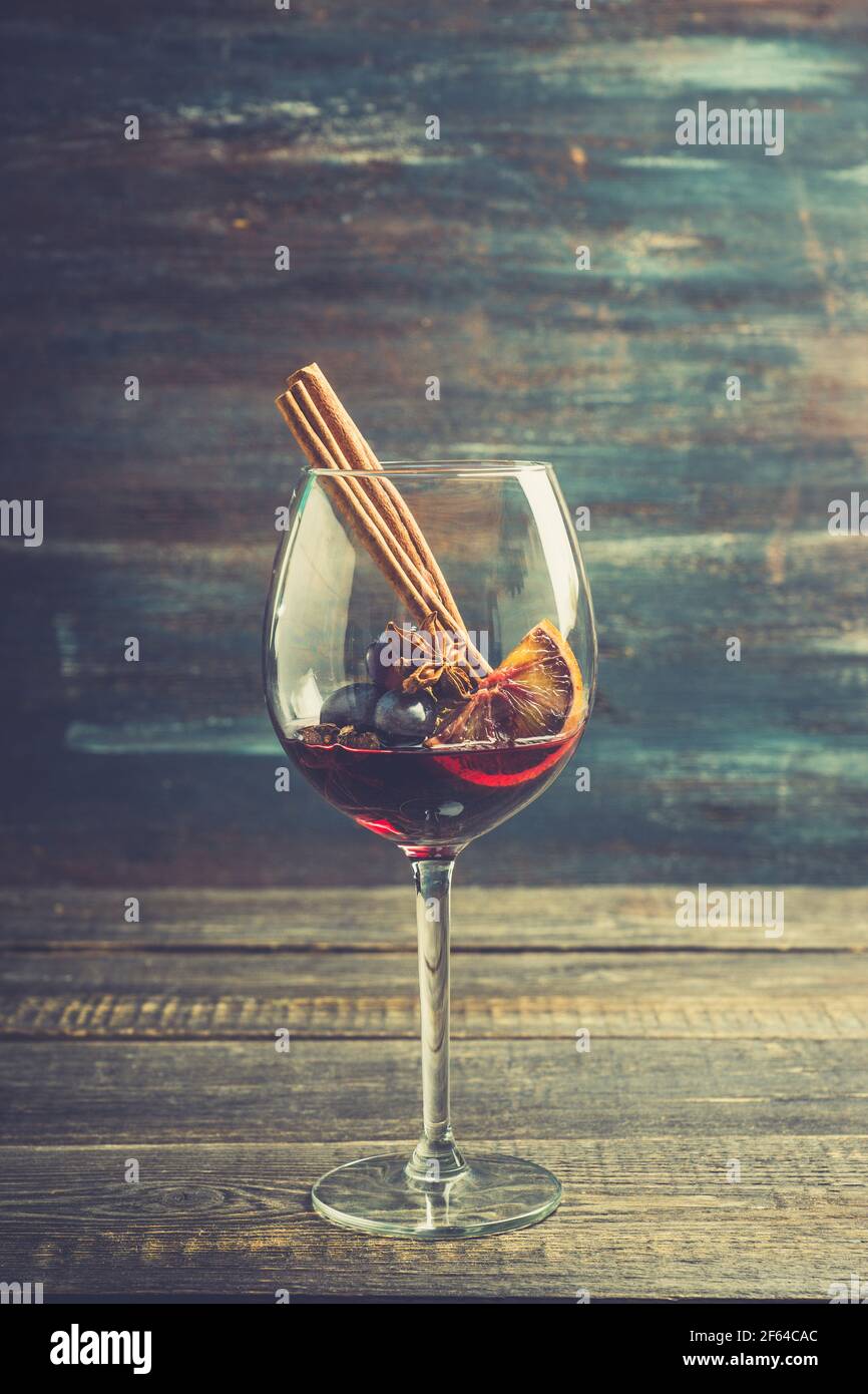 Red wine in glass on the rustic background. Selective focus. Shallow ...