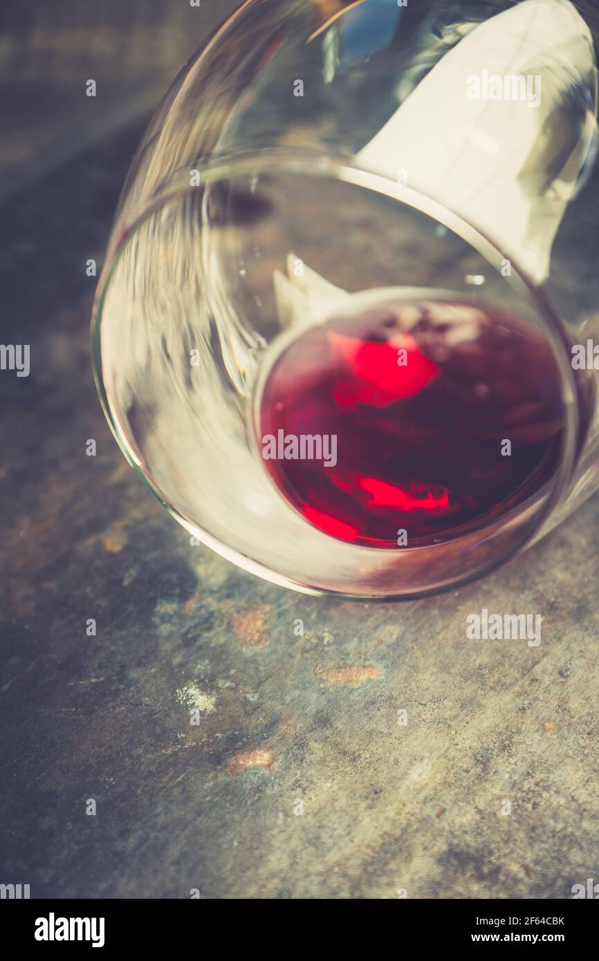 Red wine in glass on the rustic background. Selective focus. Shallow ...